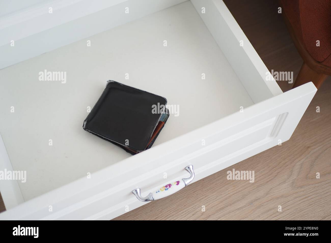 The Concept of a Wallet Situated in an Empty Drawer Embracing ...