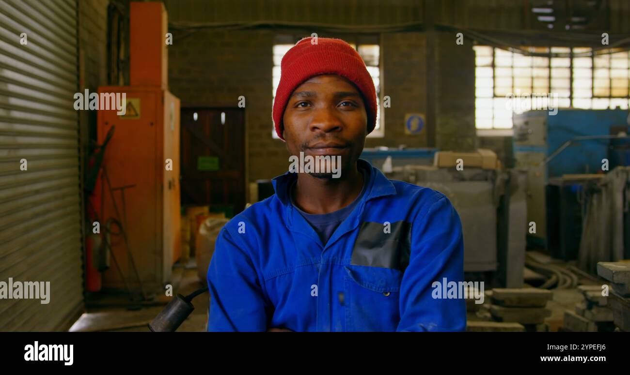 Worker standing arms crossed in hi-res stock photography and images - Alamy