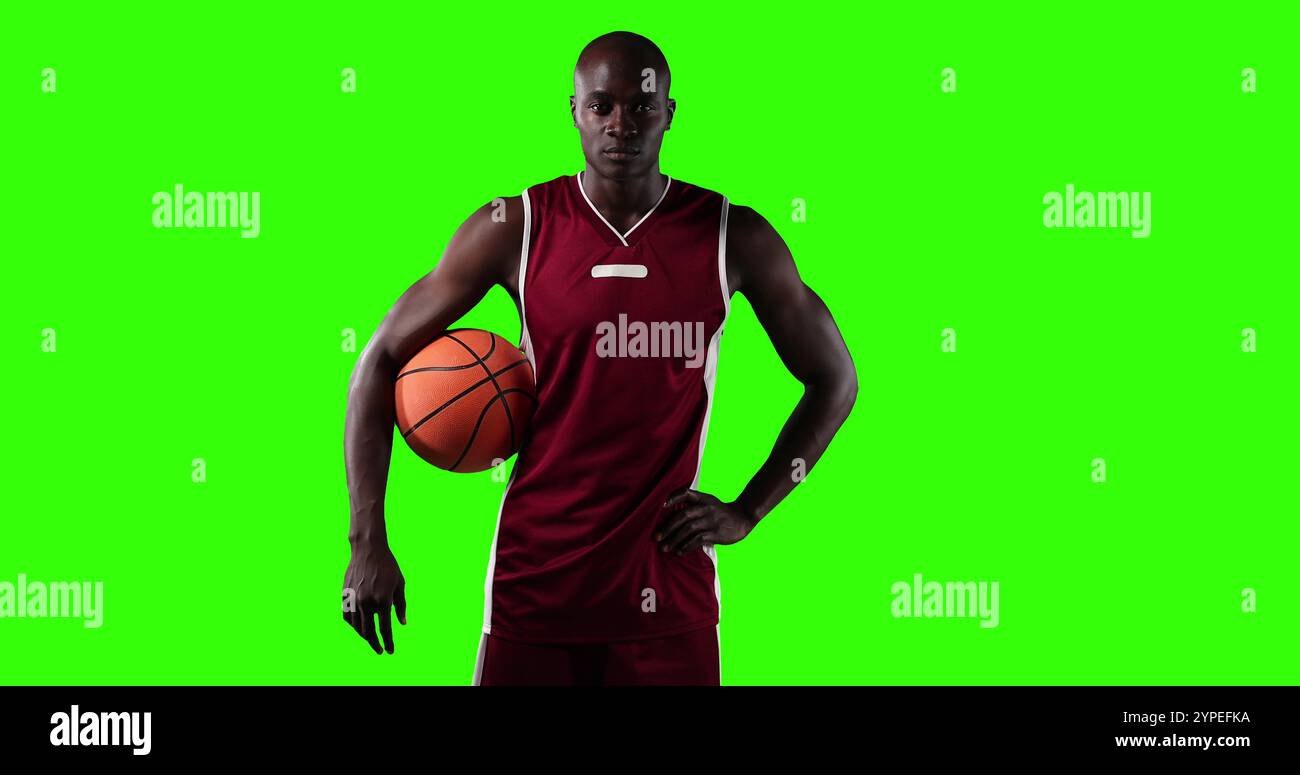 Portrait of confident male African American basketball player wearing ...