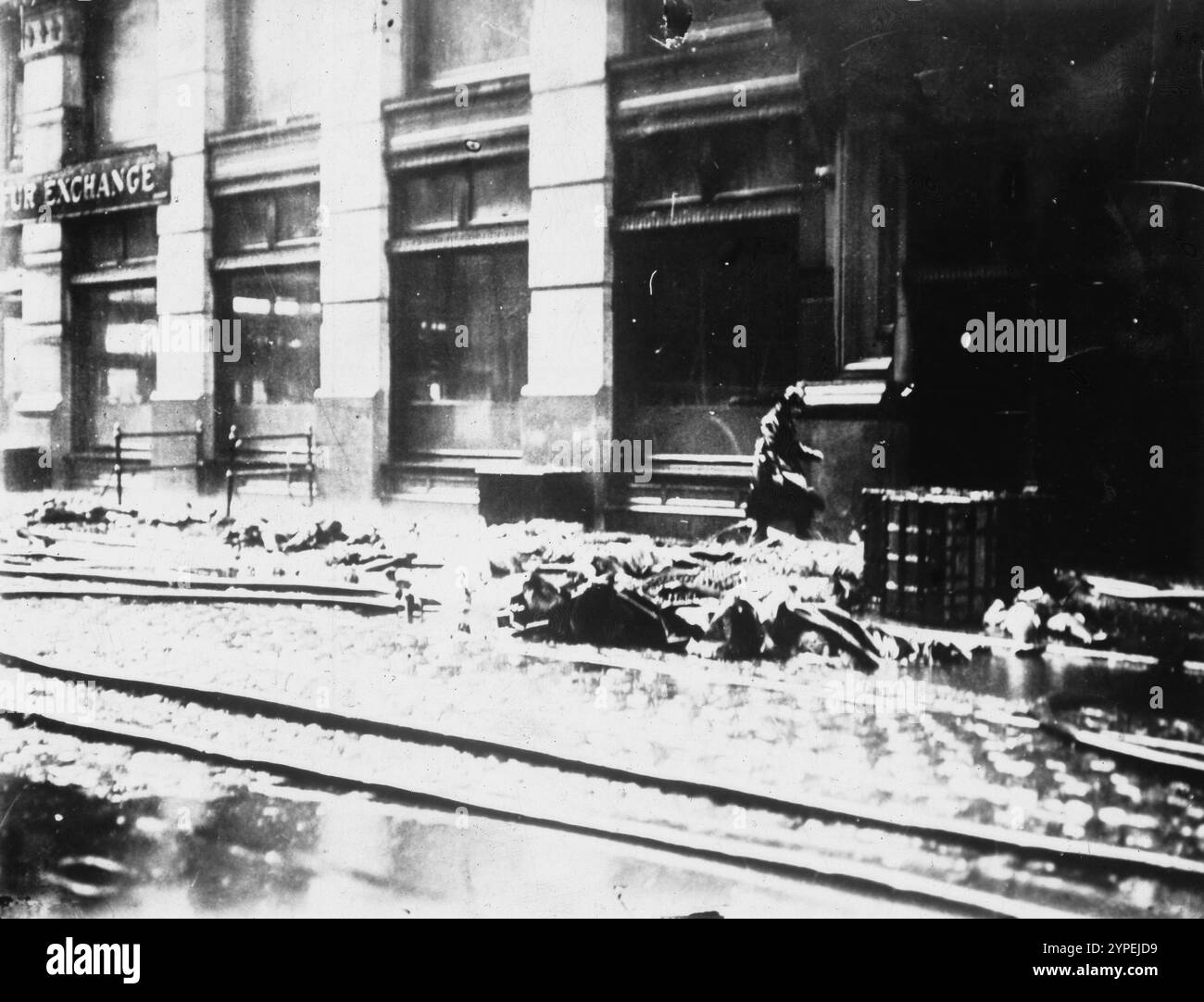 Litters and bodies on the street in front of the Asch Building during ...
