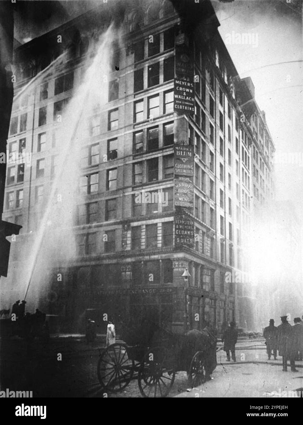 Firemen spraying water on the burning Asch Building during the Triangle ...