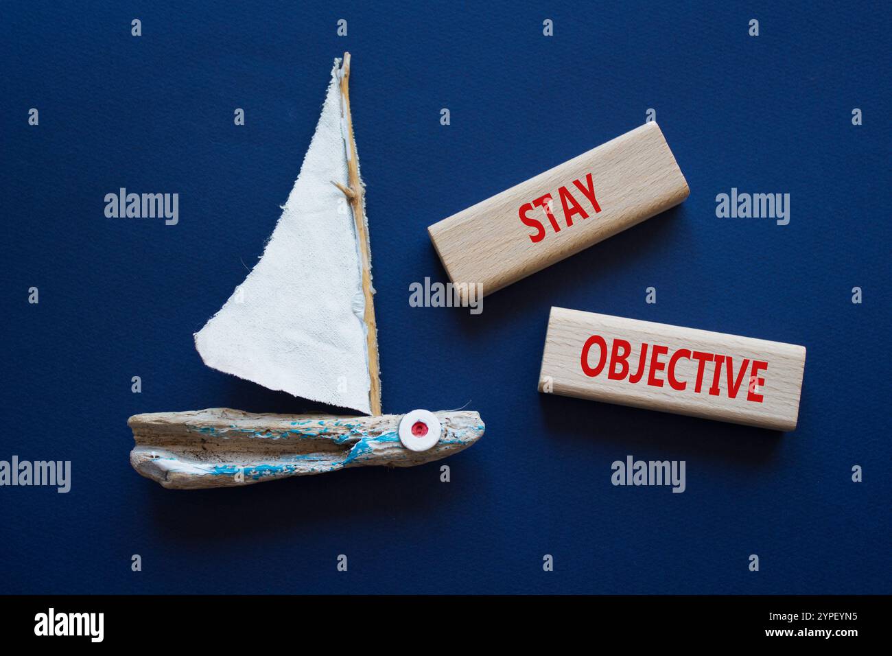 Stay Objective symbol. Wooden blocks with words Stay Objective ...