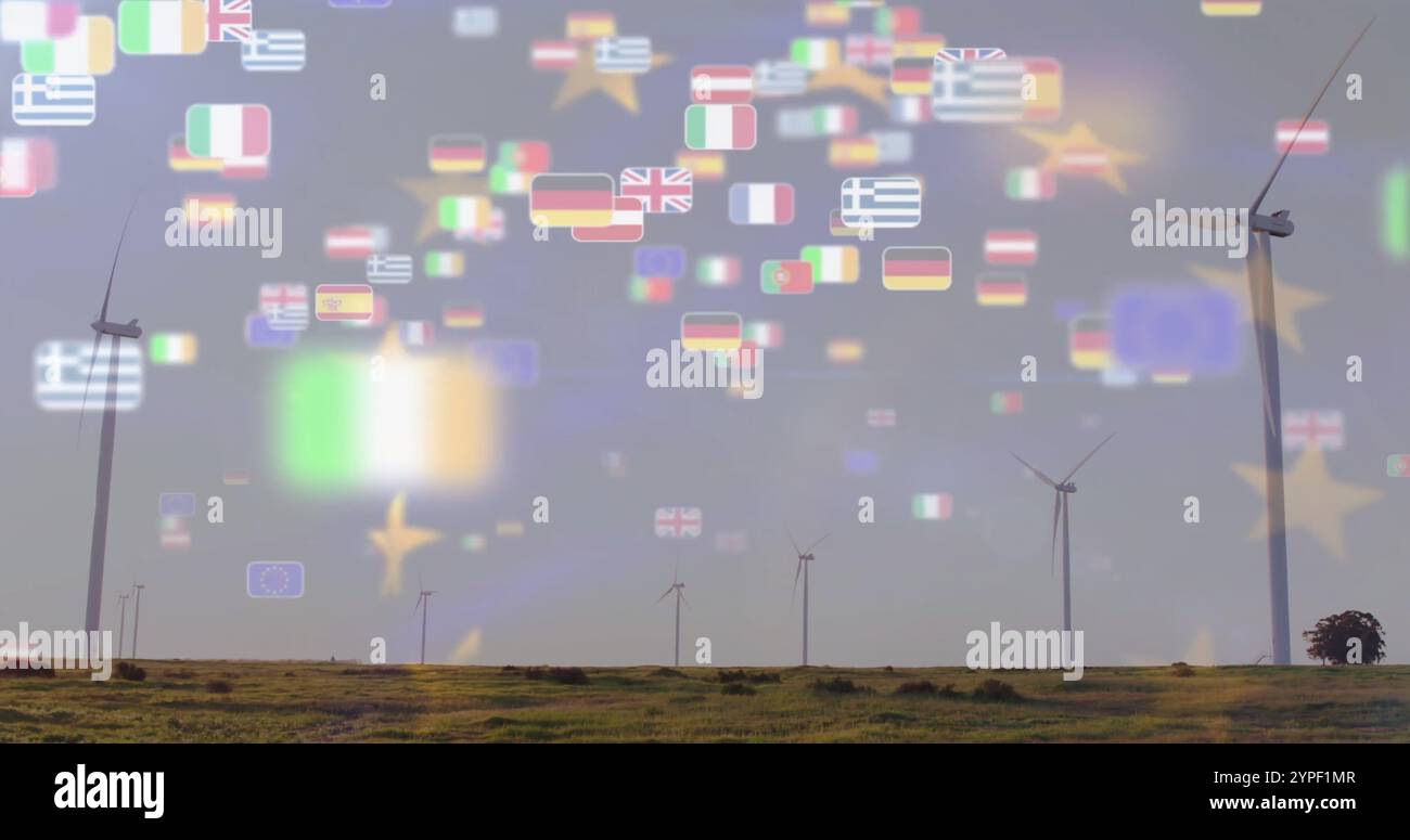 Wind turbines in field with floating international flags image ...