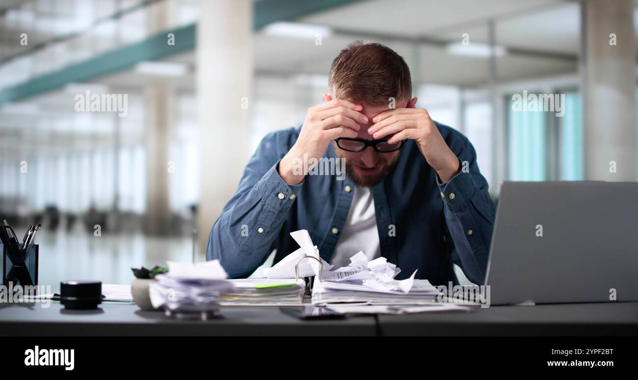Shocked Businessman Tearing Bill Document Or Invoice Stock Photo - Alamy