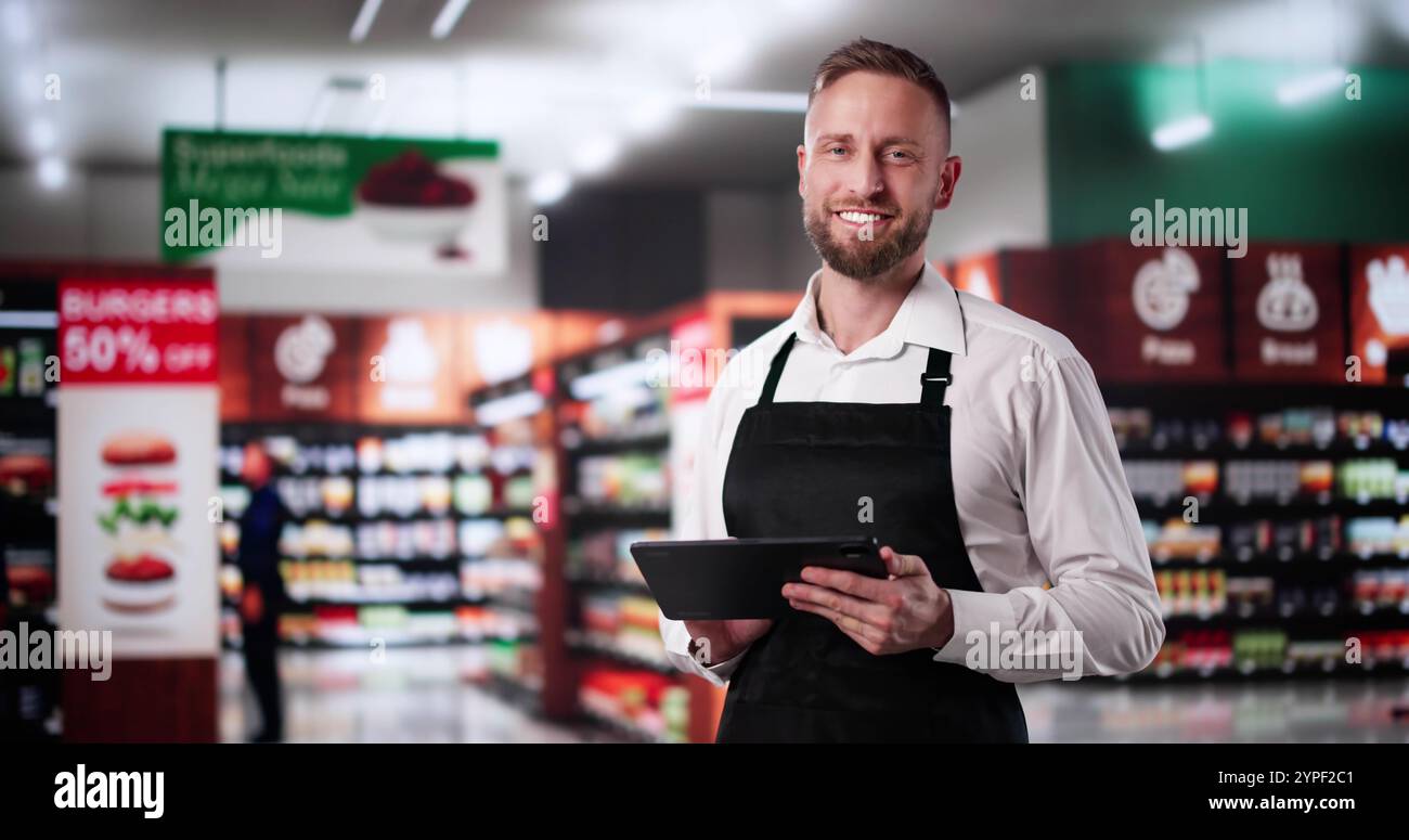 Grocery store manager using hi-res stock photography and images - Alamy