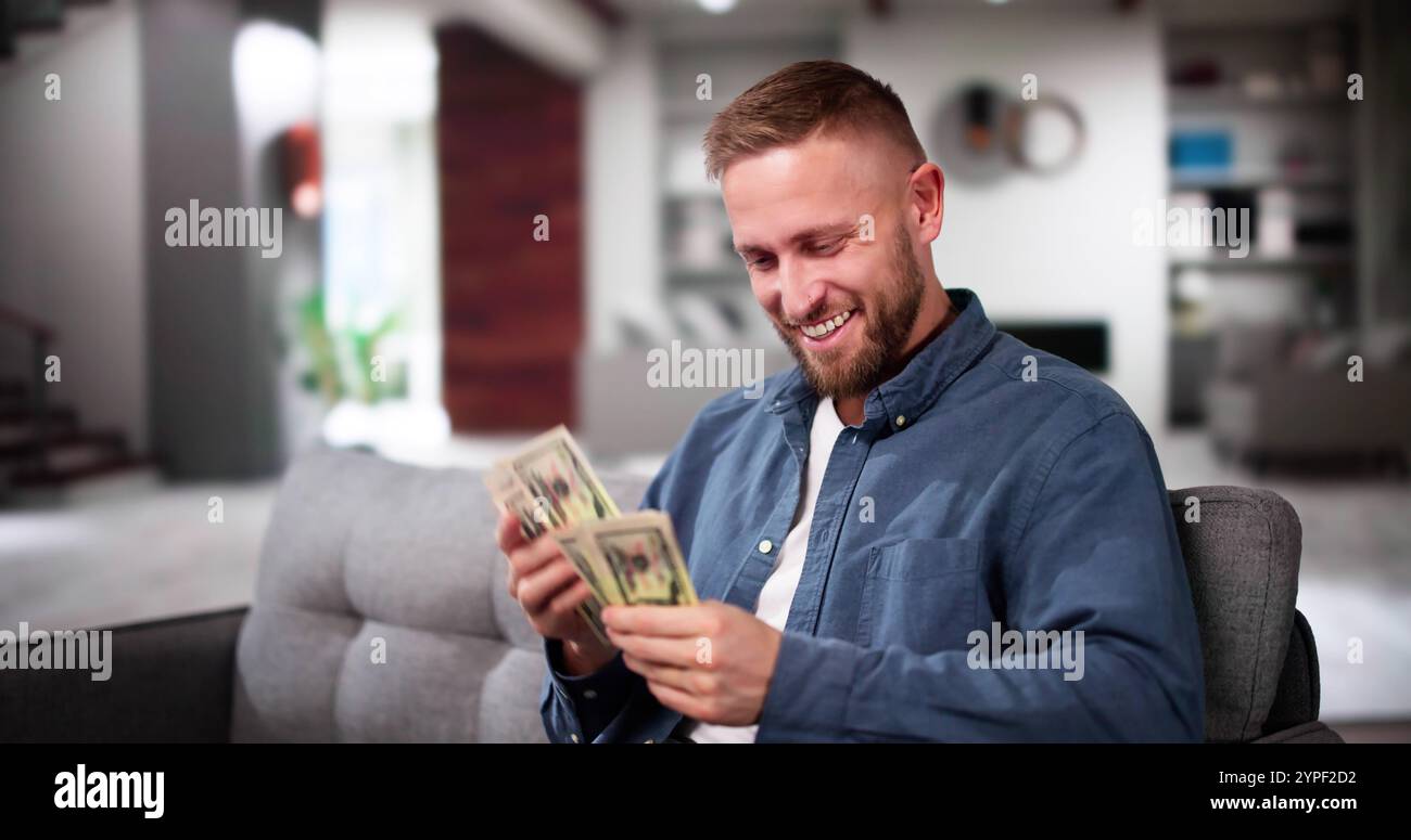 Man counting money indoors closeup hi-res stock photography and images ...