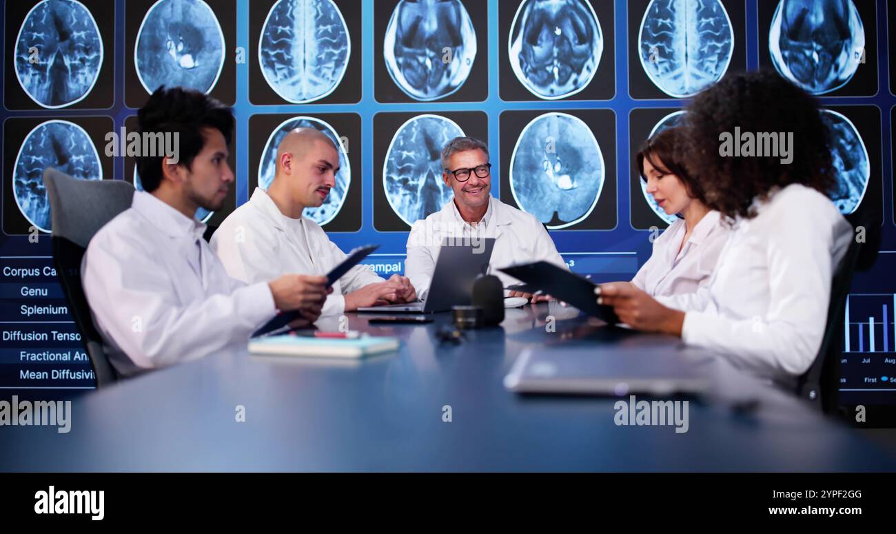 Doctors In Clinic Looking At Brain MRI Scans Stock Photo - Alamy