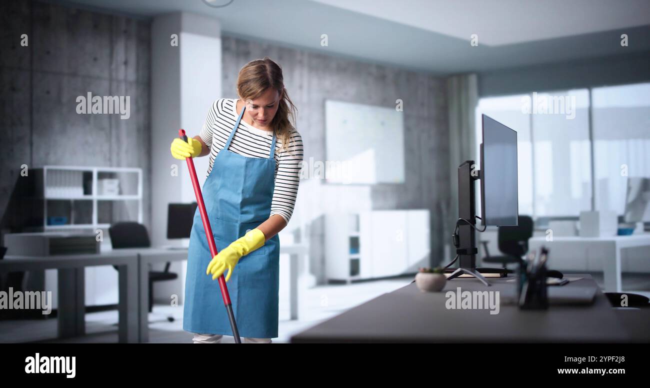 Female Janitor With Mop Cleaning Modern Office Floor Stock Photo - Alamy