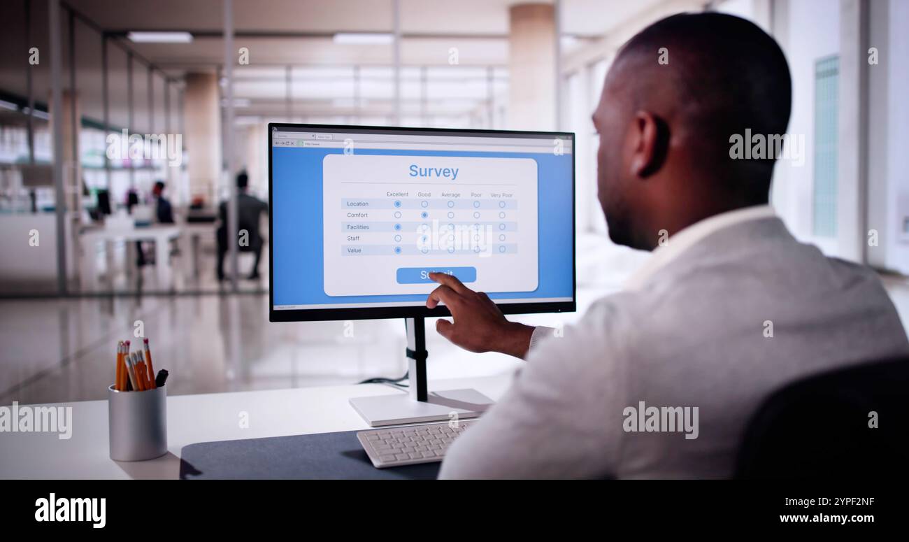 Online Survey Form. Man Filling List On Laptop Computer Stock Photo - Alamy