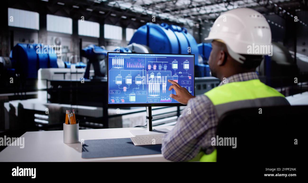 Power Plant Worker Using Scada Control System Stock Photo - Alamy