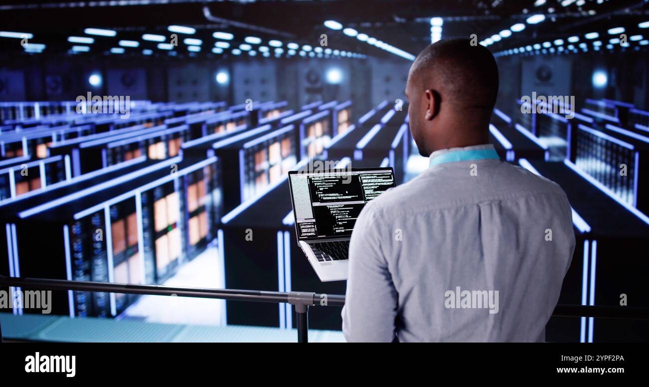 Happy Engineer In Data Center Server Room Configuring AI Technology Stock Photo - Alamy