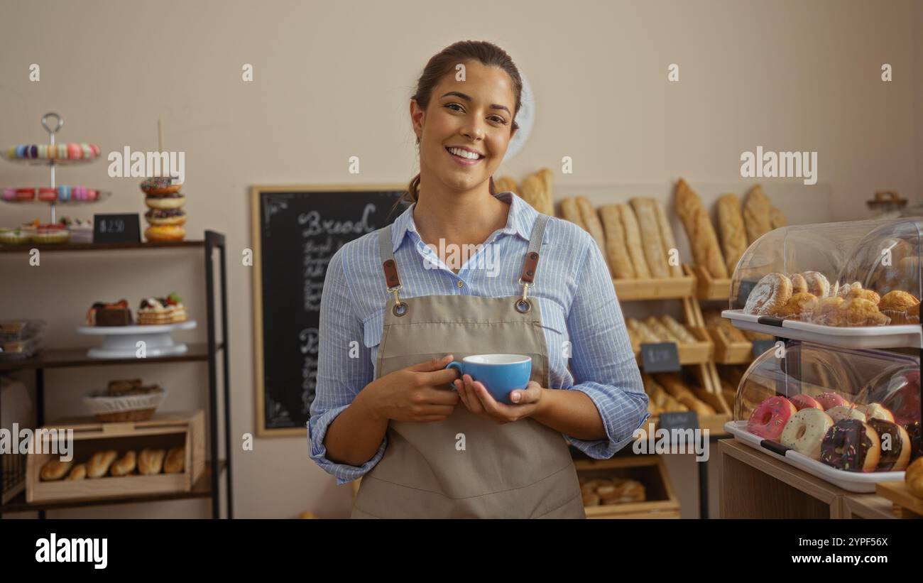 Bakery shop vendor in apron hi-res stock photography and images - Alamy