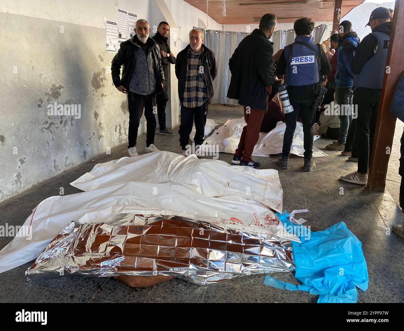 Relatives and loved of Palestinians, who died in Israeli attacks on the ...