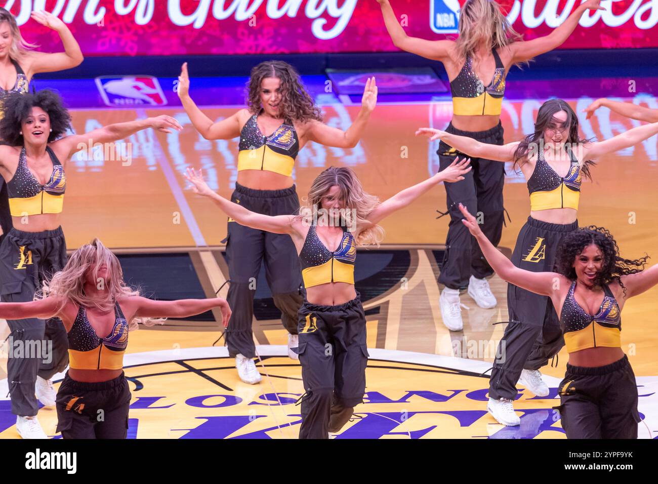 Cheerleaders perform during basketball game hi-res stock photography ...