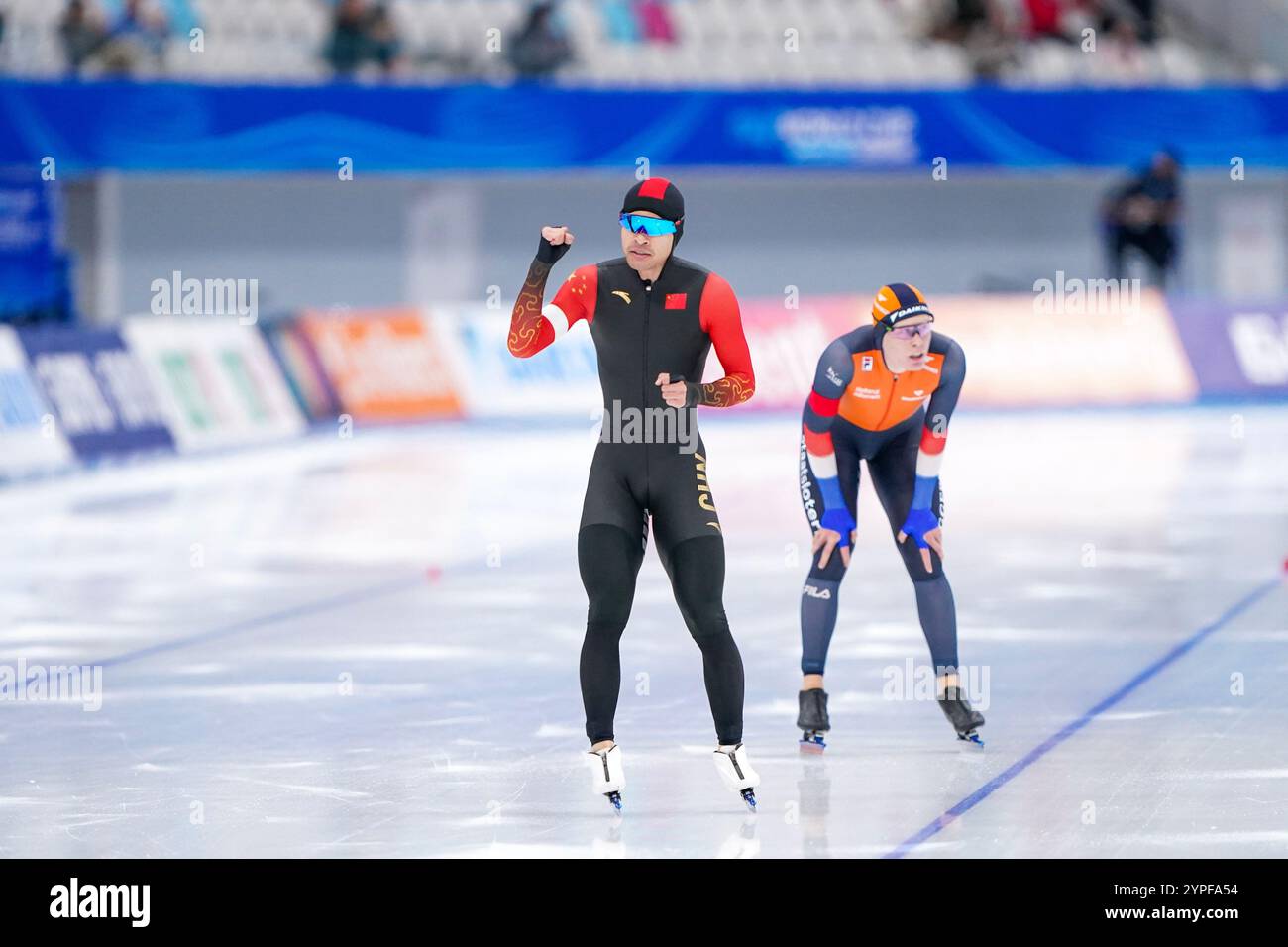 BEIJING, CHINA - NOVEMBER 30: Zhongyan Ning, Tim Prins competing on the ...