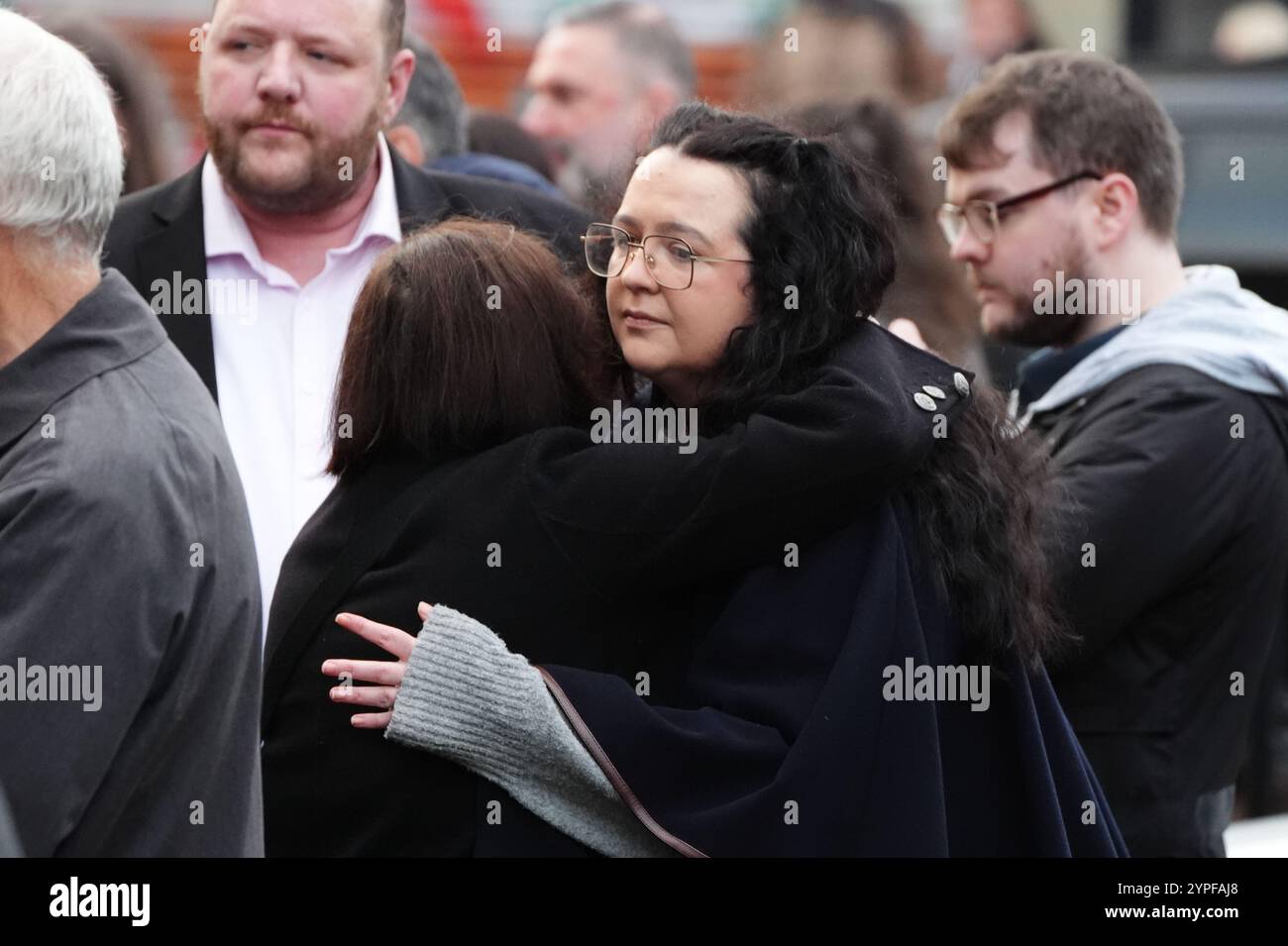 Ashley Storrie (right) arriving for the funeral of her mother and ...