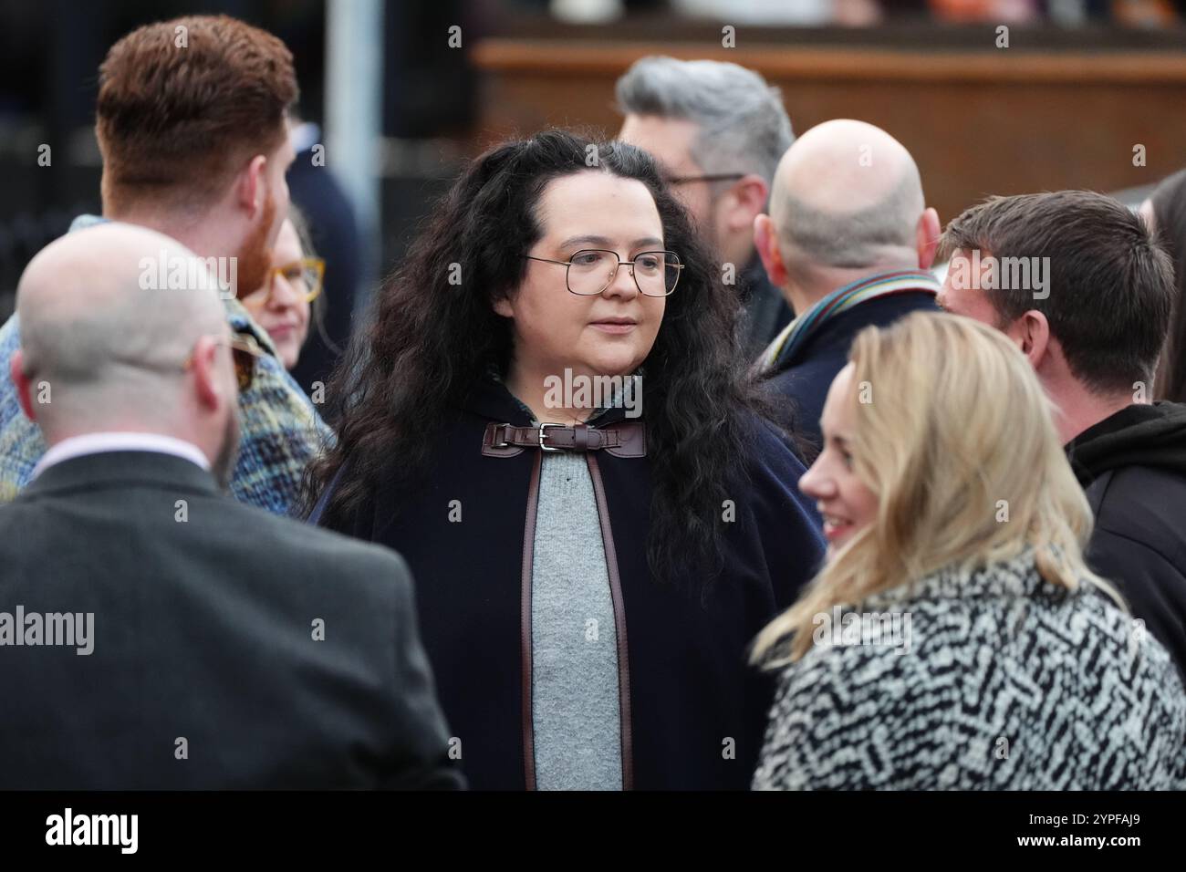 Ashley Storrie (centre) arriving for the funeral of her mother and ...
