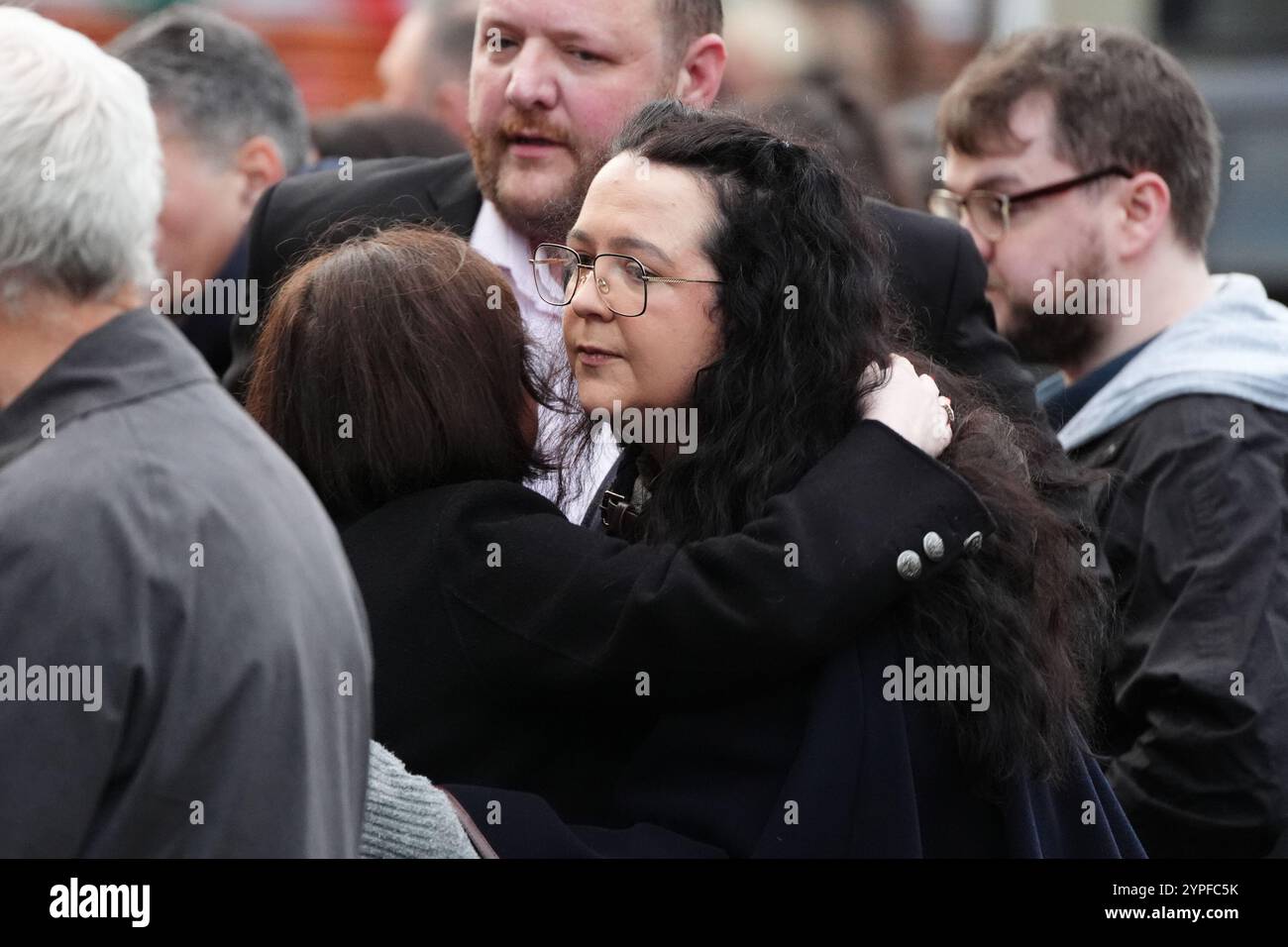 Ashley Storrie (right) arriving for the funeral of her mother and ...