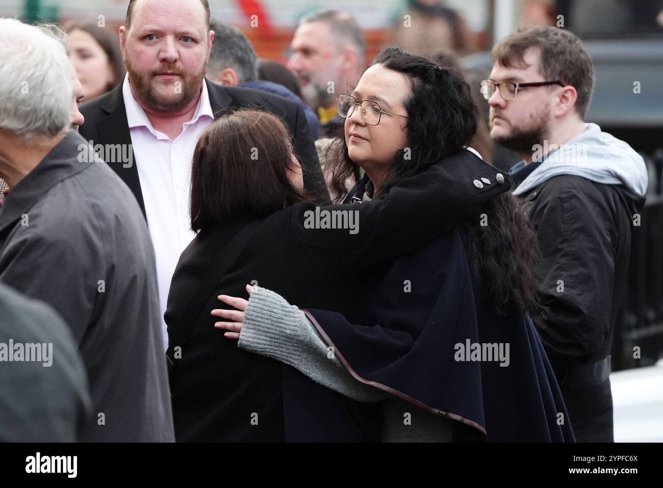 Ashley Storrie (right) arriving for the funeral of her mother and ...