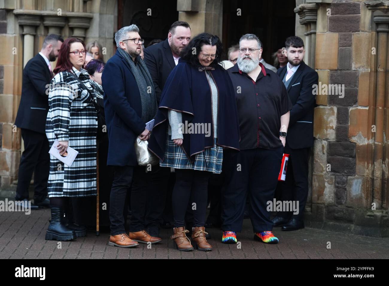 Ashley Storrie (centre) following the funeral of her mother and ...