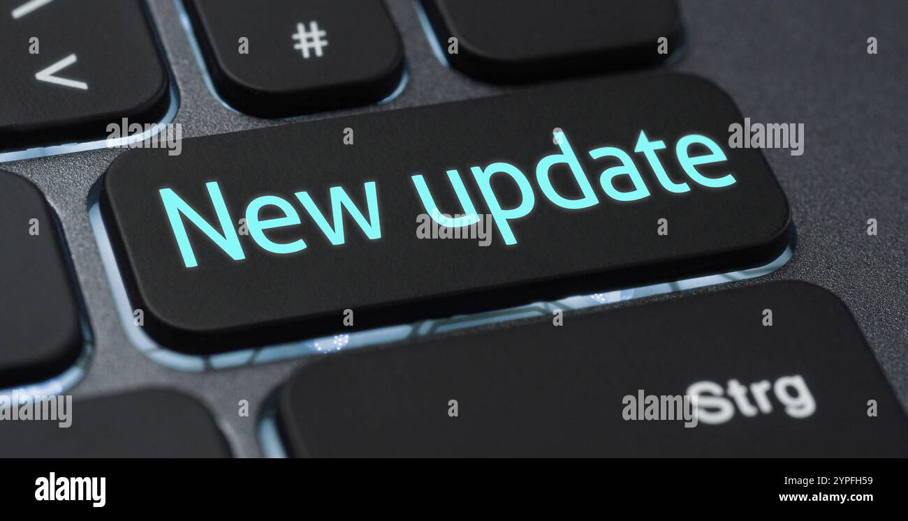 Illuminated keyboard with a labeled key - New Update Stock Photo - Alamy