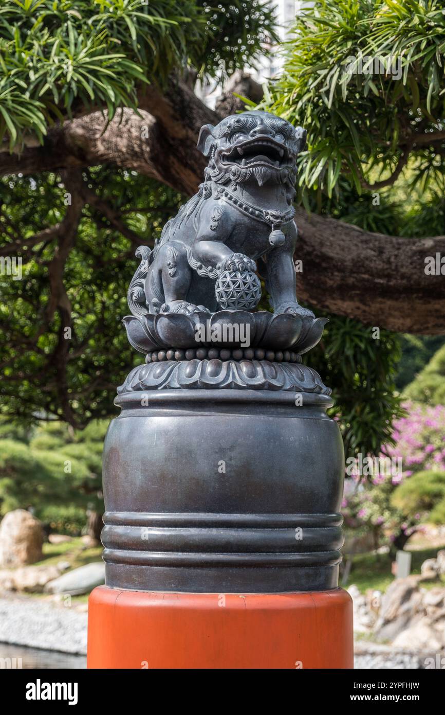 Ancient Bronze Lion Statue on Lotus Base at Nan Lian Garden, Hong Kong Stock Photo - Alamy
