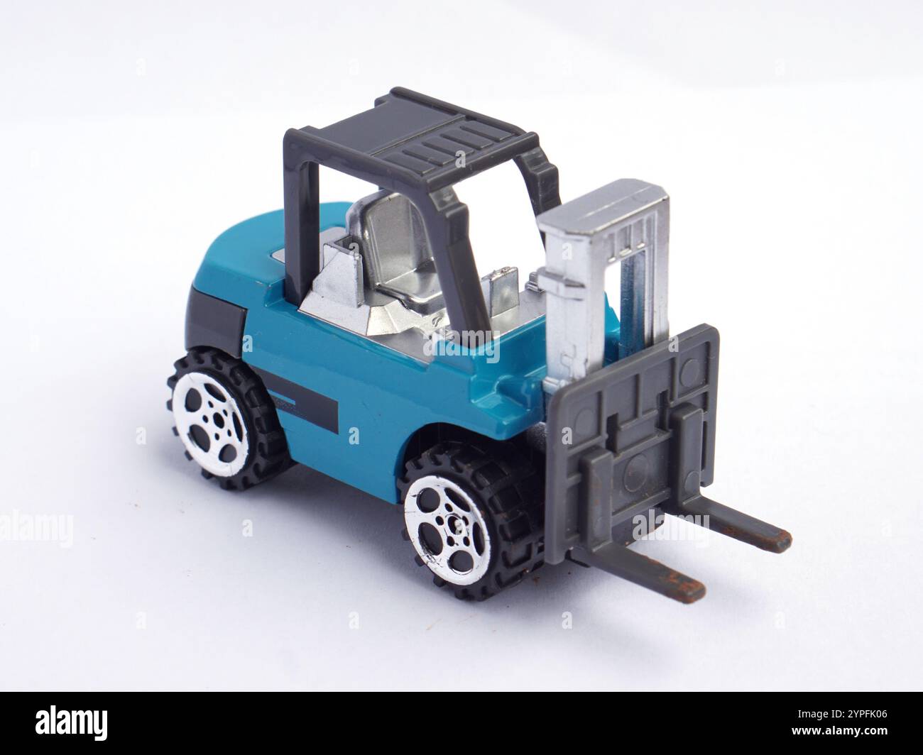 blue forklift loader toy isolated on white background. logistics and ...