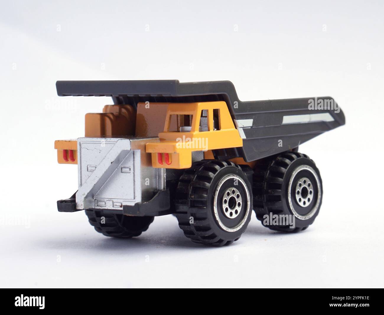toy mining dump truck isolated on white background. heavy vehicle ...