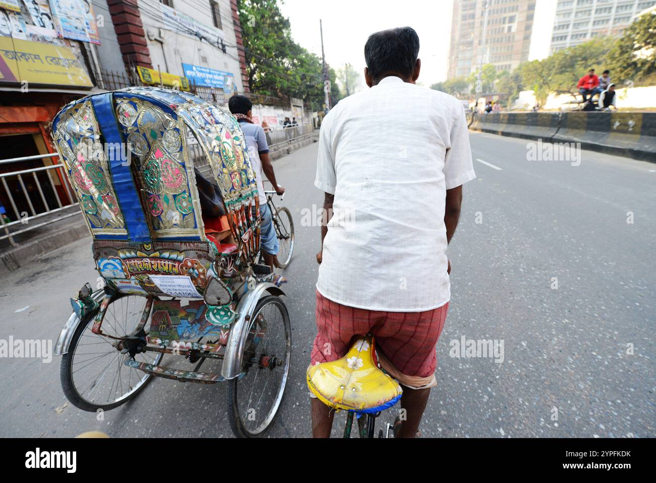 Colorful cycle rickshaws roaming the streets of Dhaka, Bangladesh Stock Photo - Alamy