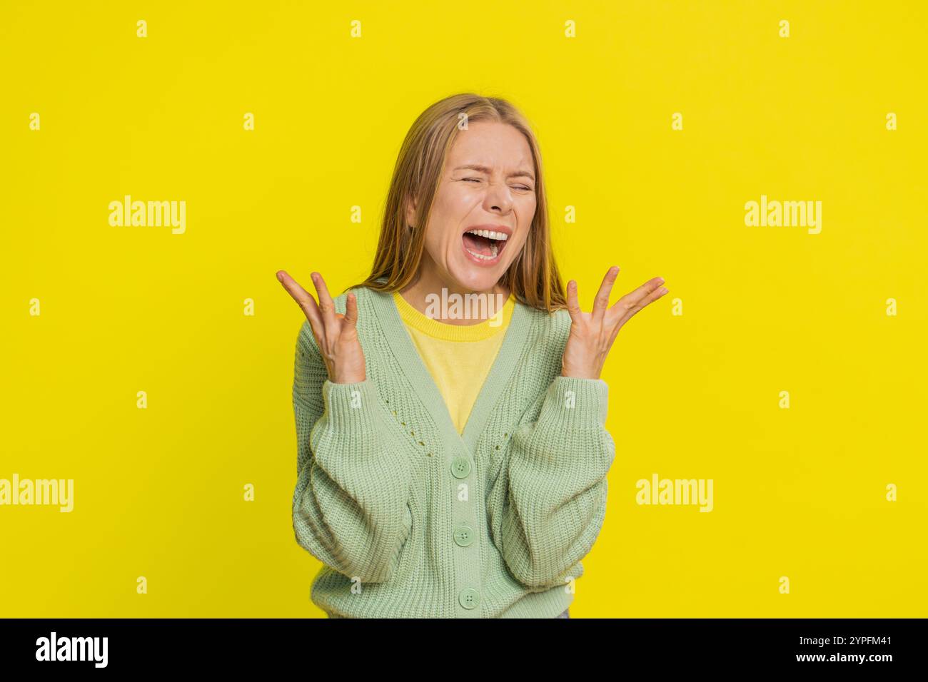 Irritated angry Caucasian young woman 40 years old screams from stress ...