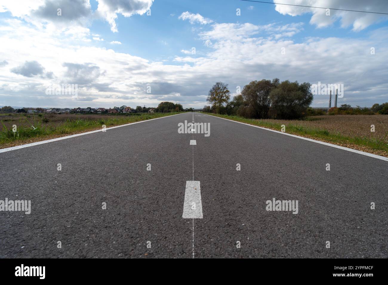Driving in straight paved road hi-res stock photography and images - Alamy