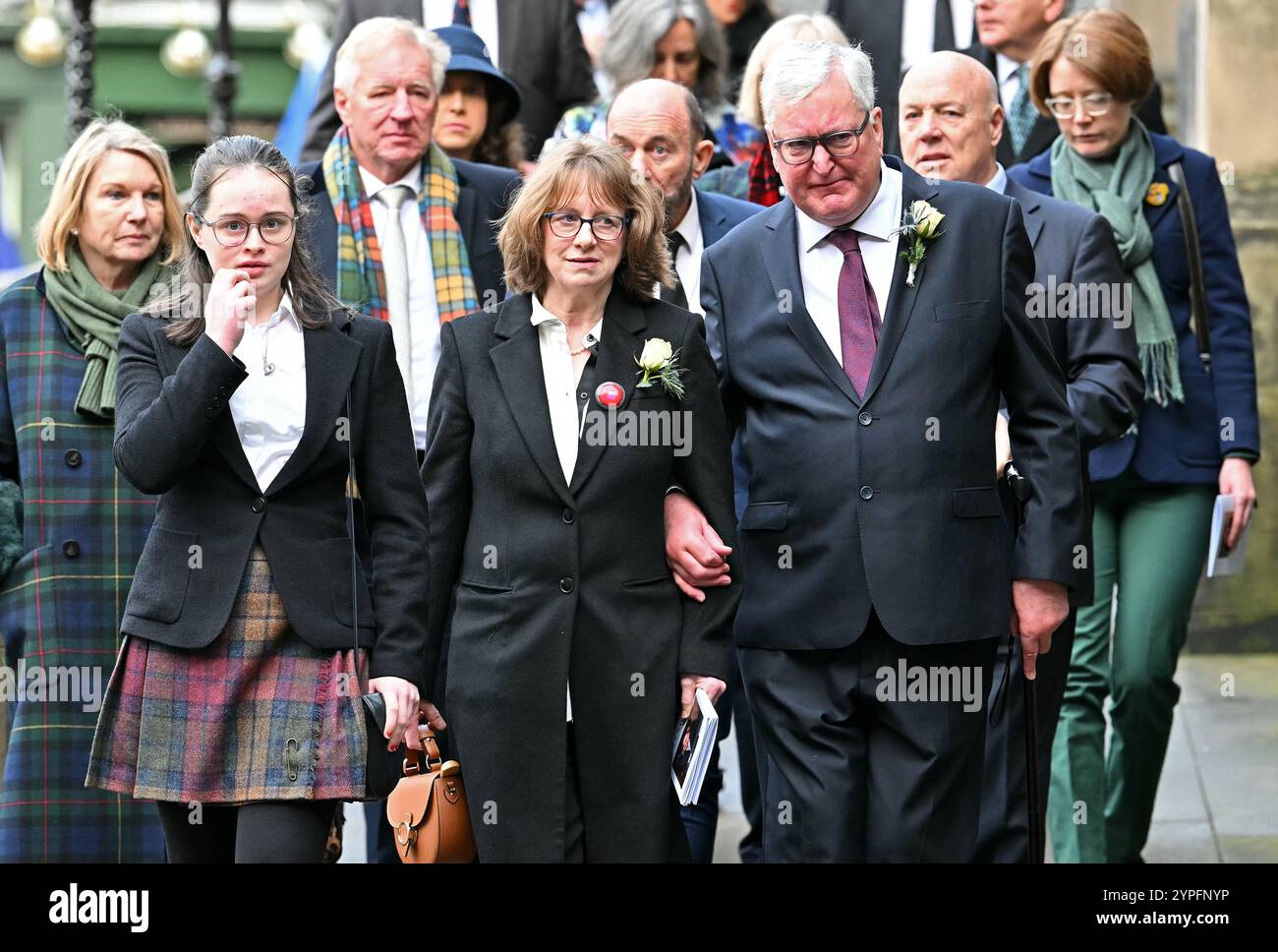 MSP Fergus Ewing (right) and his wife Margaret (centre) leaving St ...
