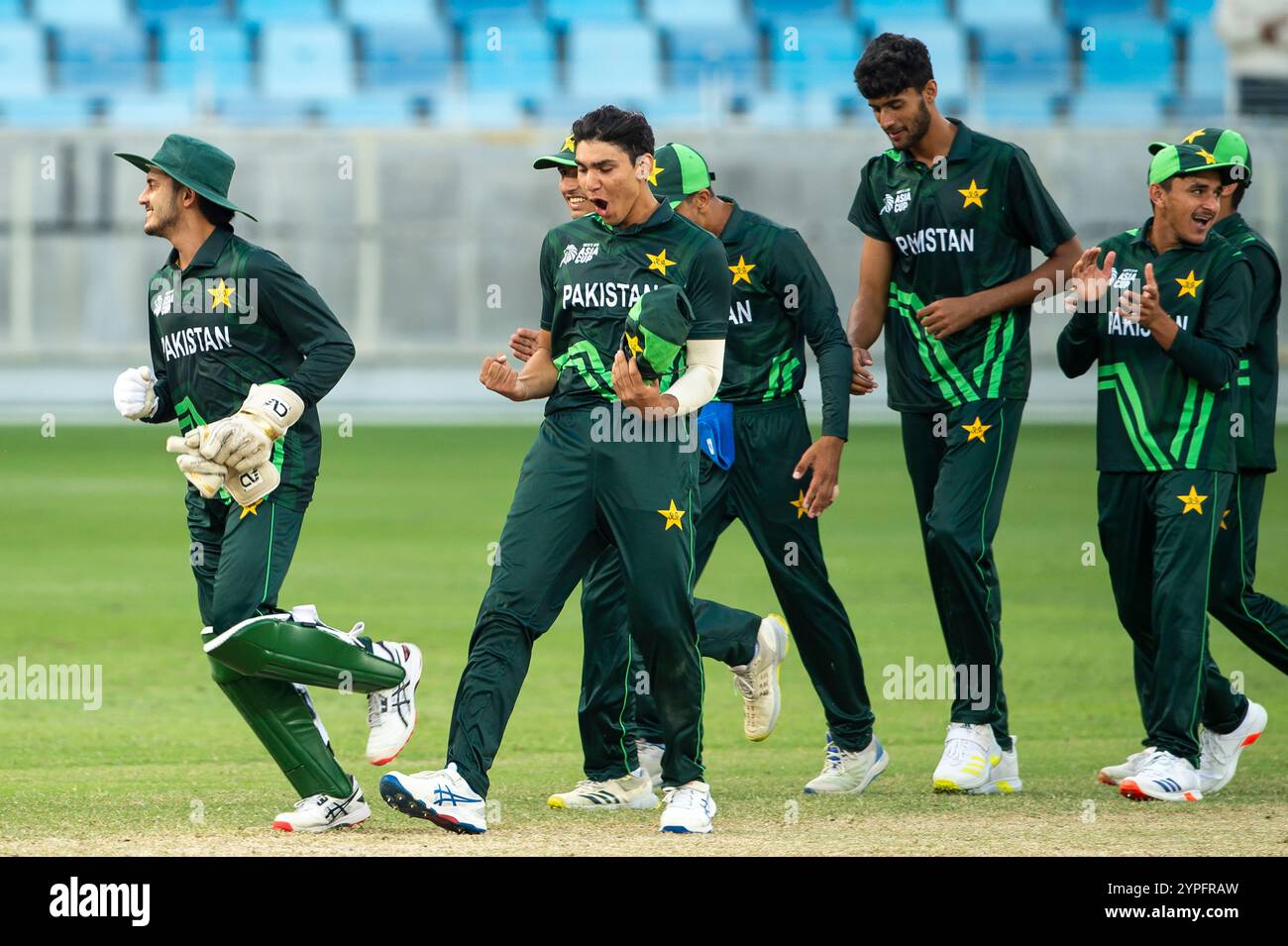 Pakistan team members celebrate their win in the Asian Cricket Council ...
