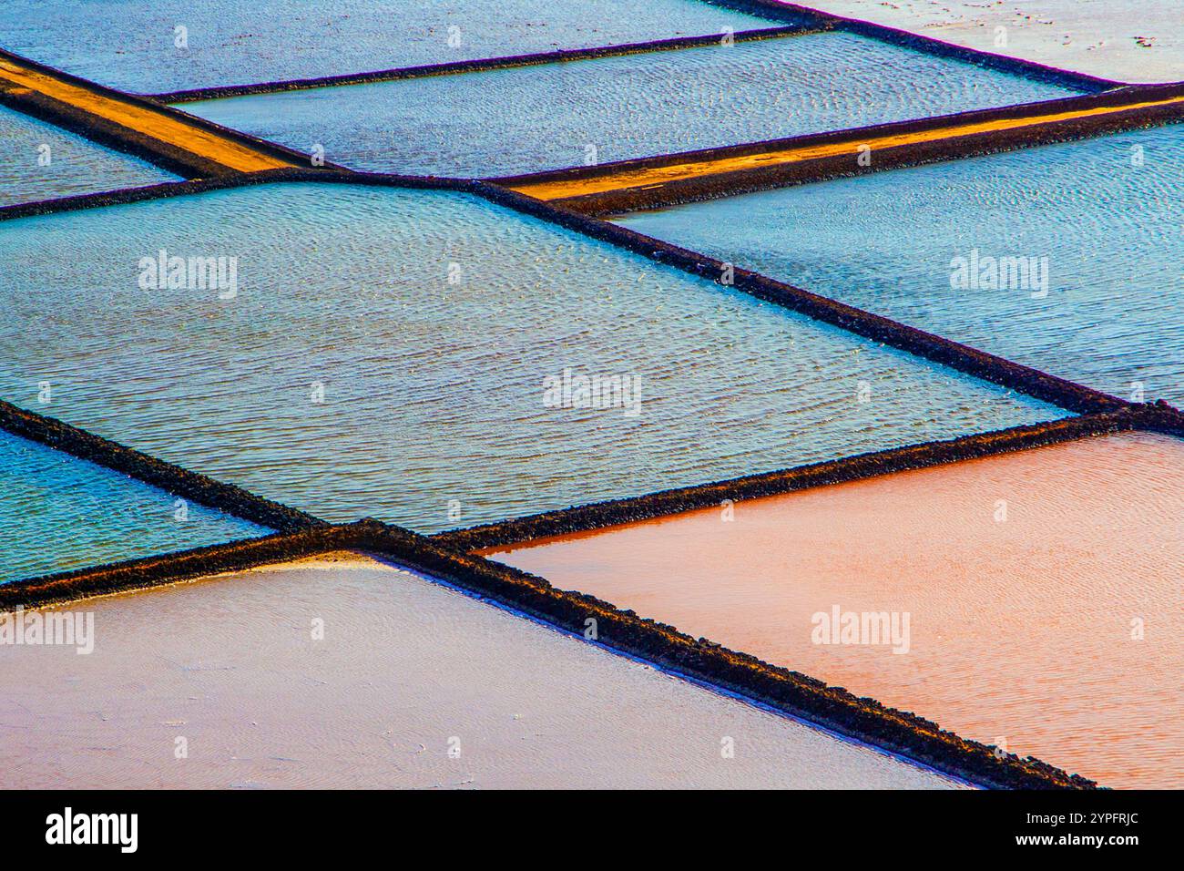 scenic pattern of colorful basins at the salt mine in the saline of ...