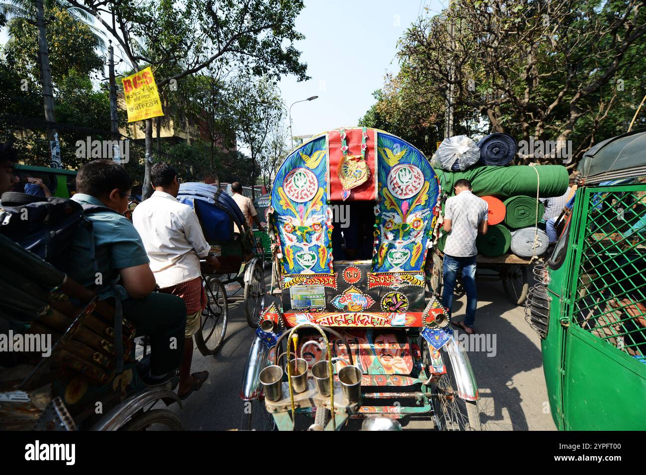 Colorful cycle rickshaws roaming the streets of Dhaka, Bangladesh Stock Photo - Alamy