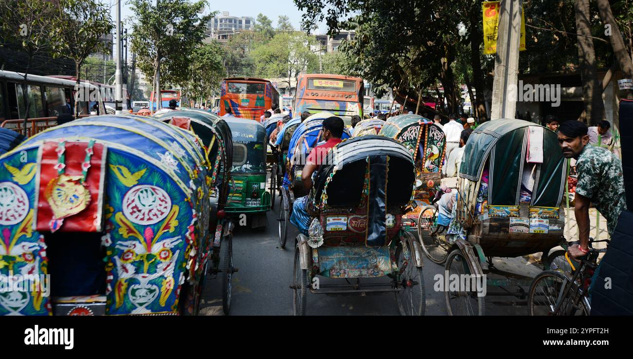 Colorful cycle rickshaws roaming the streets of Dhaka, Bangladesh Stock ...