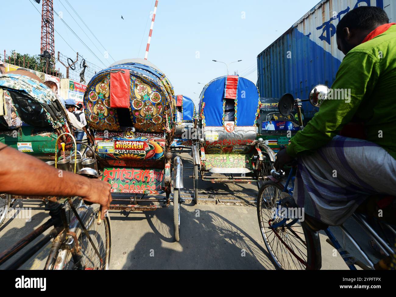 Colorful cycle rickshaws roaming the streets of Dhaka, Bangladesh Stock Photo - Alamy