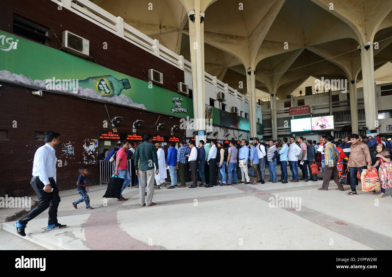 Passengers waiting in line at the ticket counter at the kamalapur rail ...
