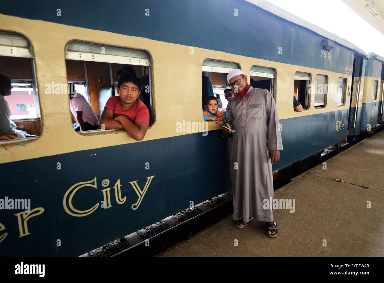 Passengers on a train at the kamalapur rail station in Dhaka ...