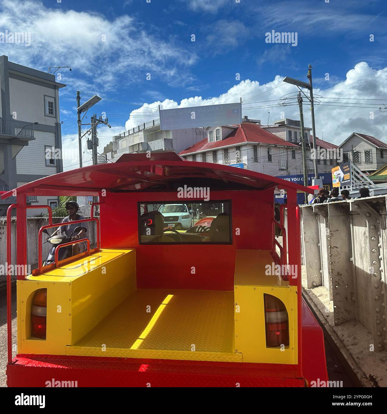 Driving over the Swing Bridge on the Calypso Train Tour, Belize City ...