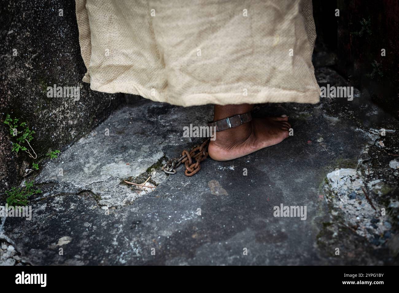 Detail of the chained feet of a black woman in Pelourinho. Slavery in ...