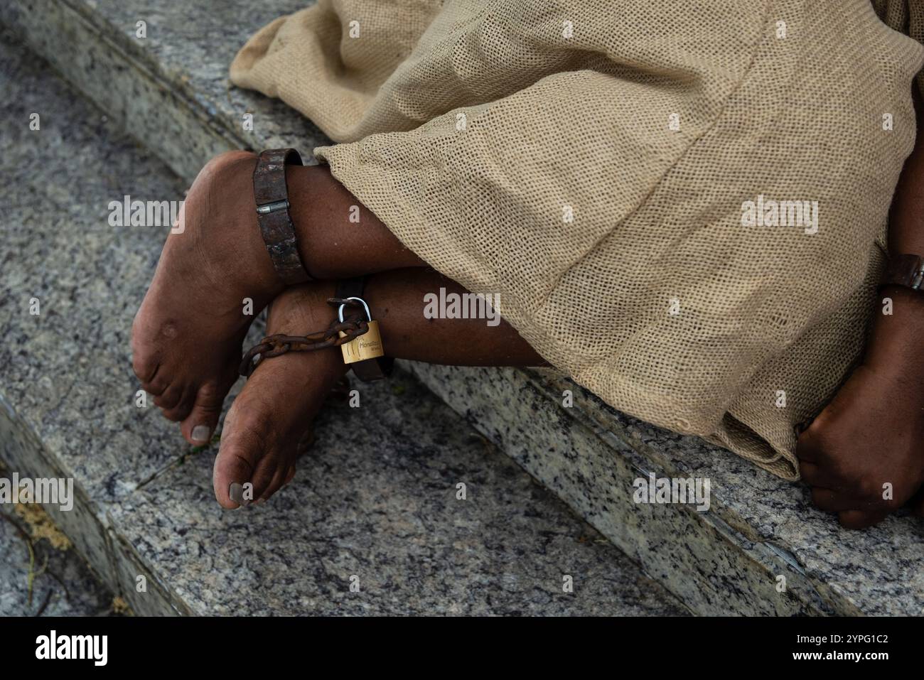 Detail of the chained feet of a black woman in Pelourinho. Slavery in ...