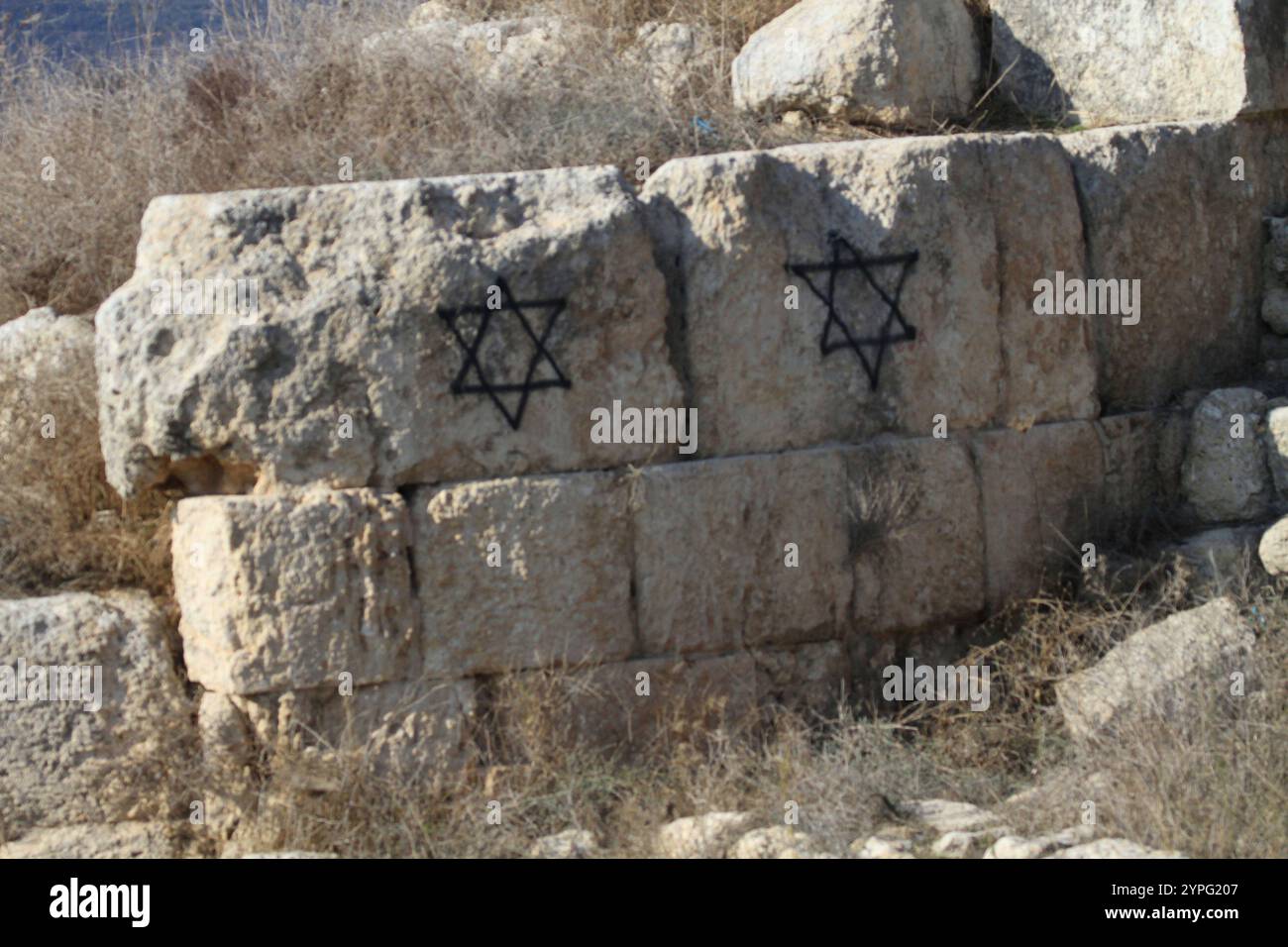 An Israeli Star of David was seen spray-painted by Jewish settlers on ...