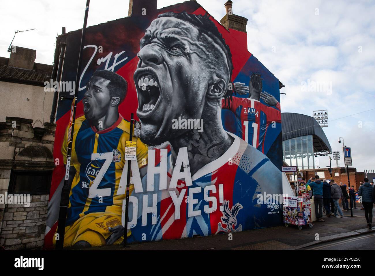 A mural for former Crystal Palace player Wilfred Zaha on display ...