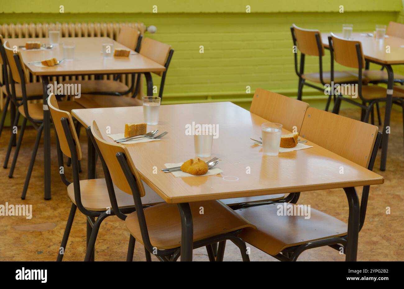 Tables prepared in a school restaurant of a public school. school ...