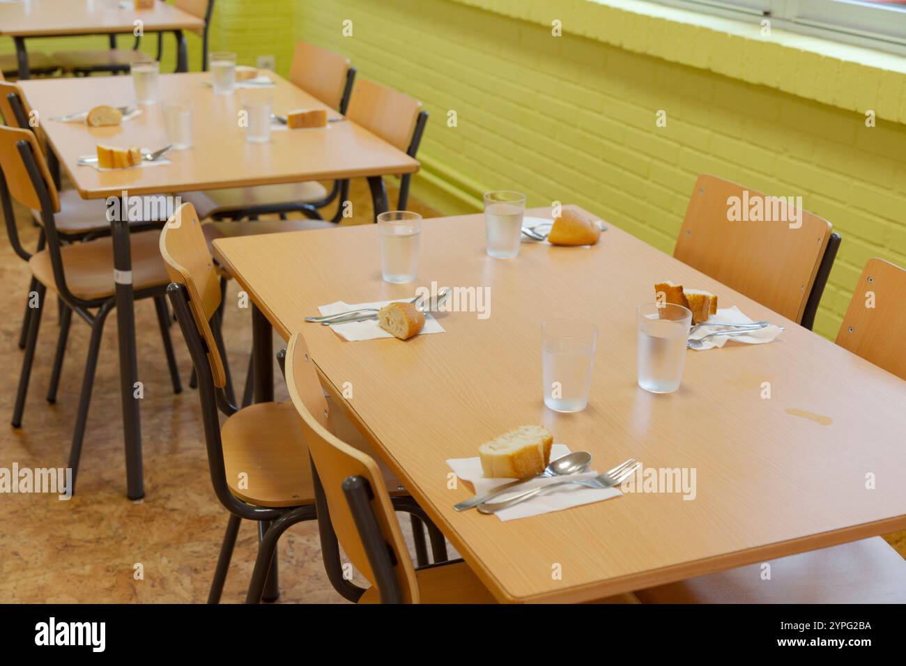 Tables prepared in a school restaurant of a public school. school ...