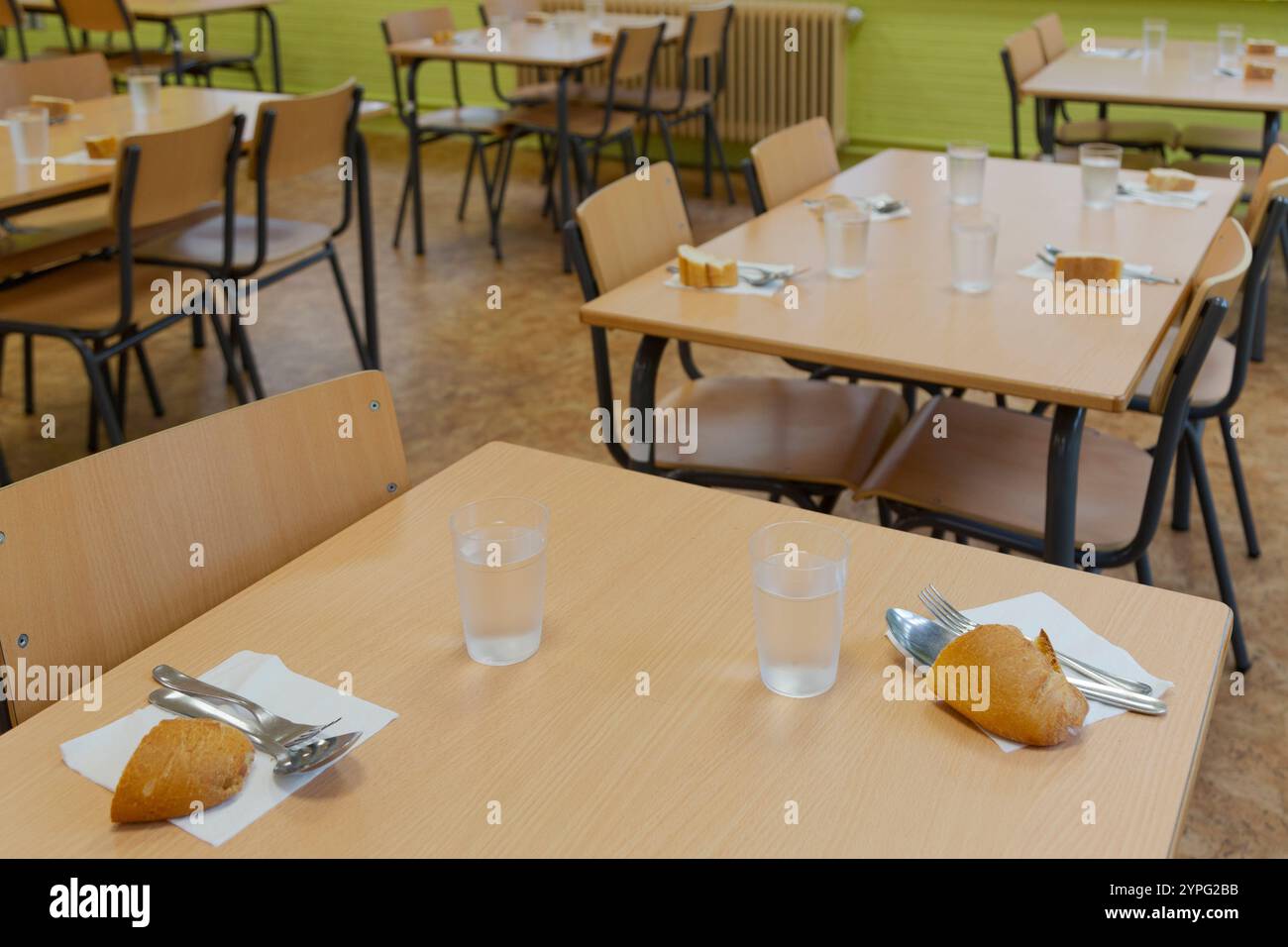 Tables prepared in a school restaurant of a public school. school ...
