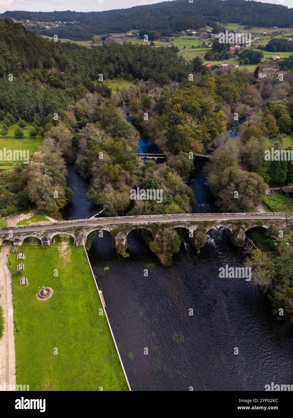 Aerial view of Ponte Ledesma bridge of medieval origin over the Ulla ...