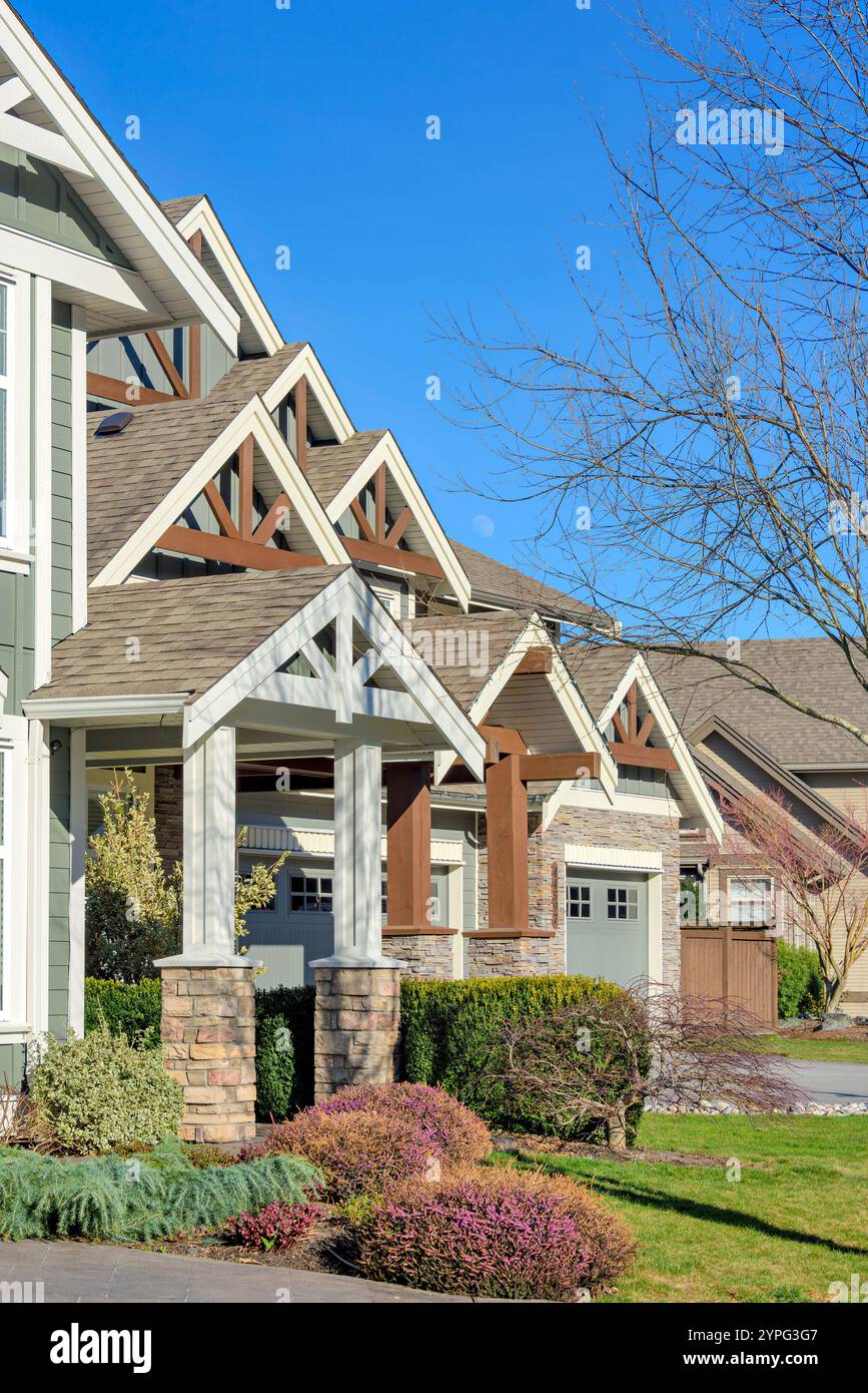 Front side of residential house on blue sky background Stock Photo - Alamy