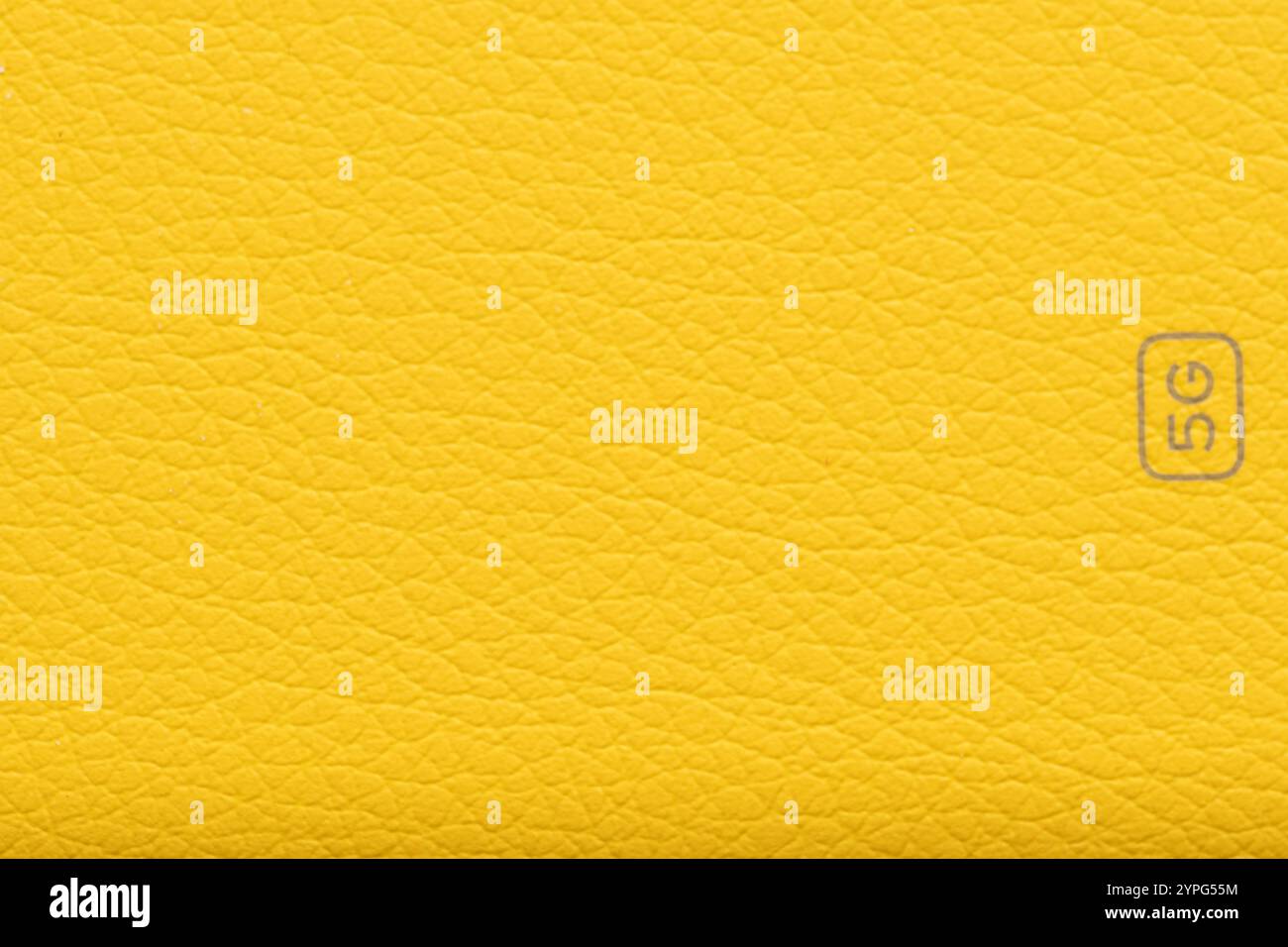 Bright yellow background with skin texture and 5G lettering Stock Photo ...